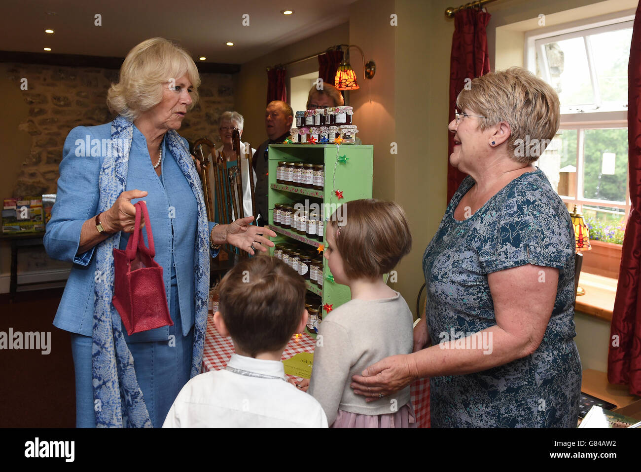 The Duchess of Cornwall receives a gift bag of homemade jam from Alfie ...