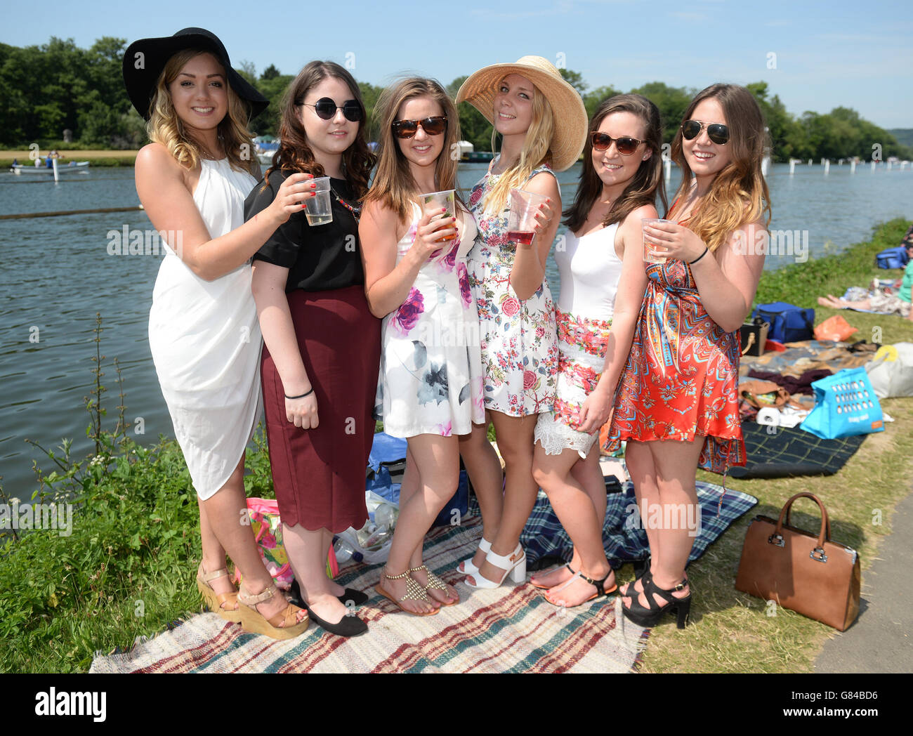 A group of friends enjoy the hot weather at the Henley-on-Thames ...