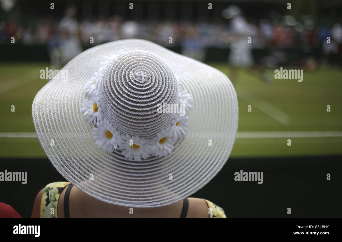 A spectator watching play during day three of the Wimbledon ...