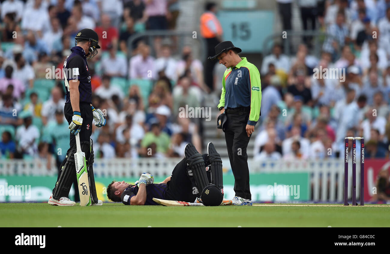 Umpire Richard Kettleborough (right) and Gloucestershire's Peter ...