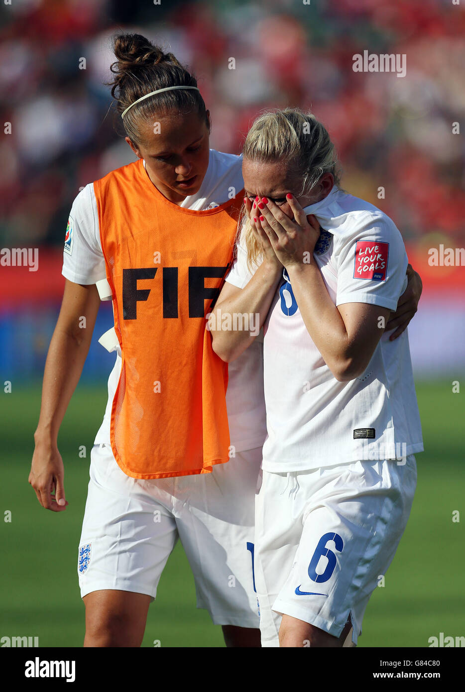 England's Laura Bassett is consoled after scoring an own goal in the 92 ...
