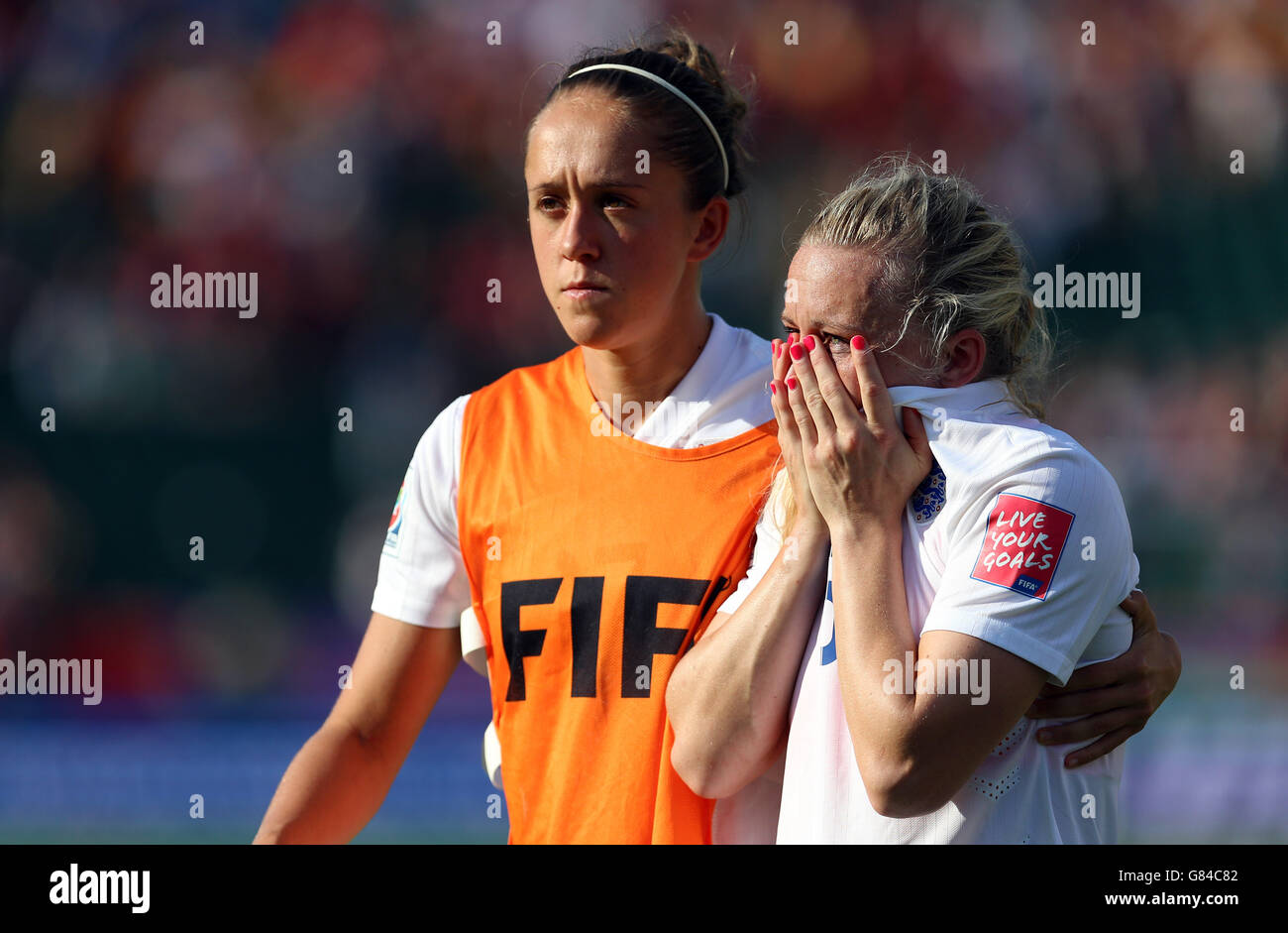 England's Laura Bassett is consoled after scoring an own goal in the 92 ...