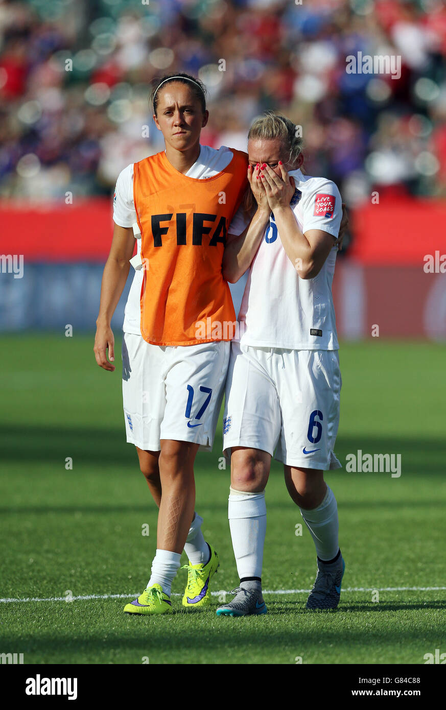 England's Laura Bassett is consoled after scoring an own goal in the 92 ...
