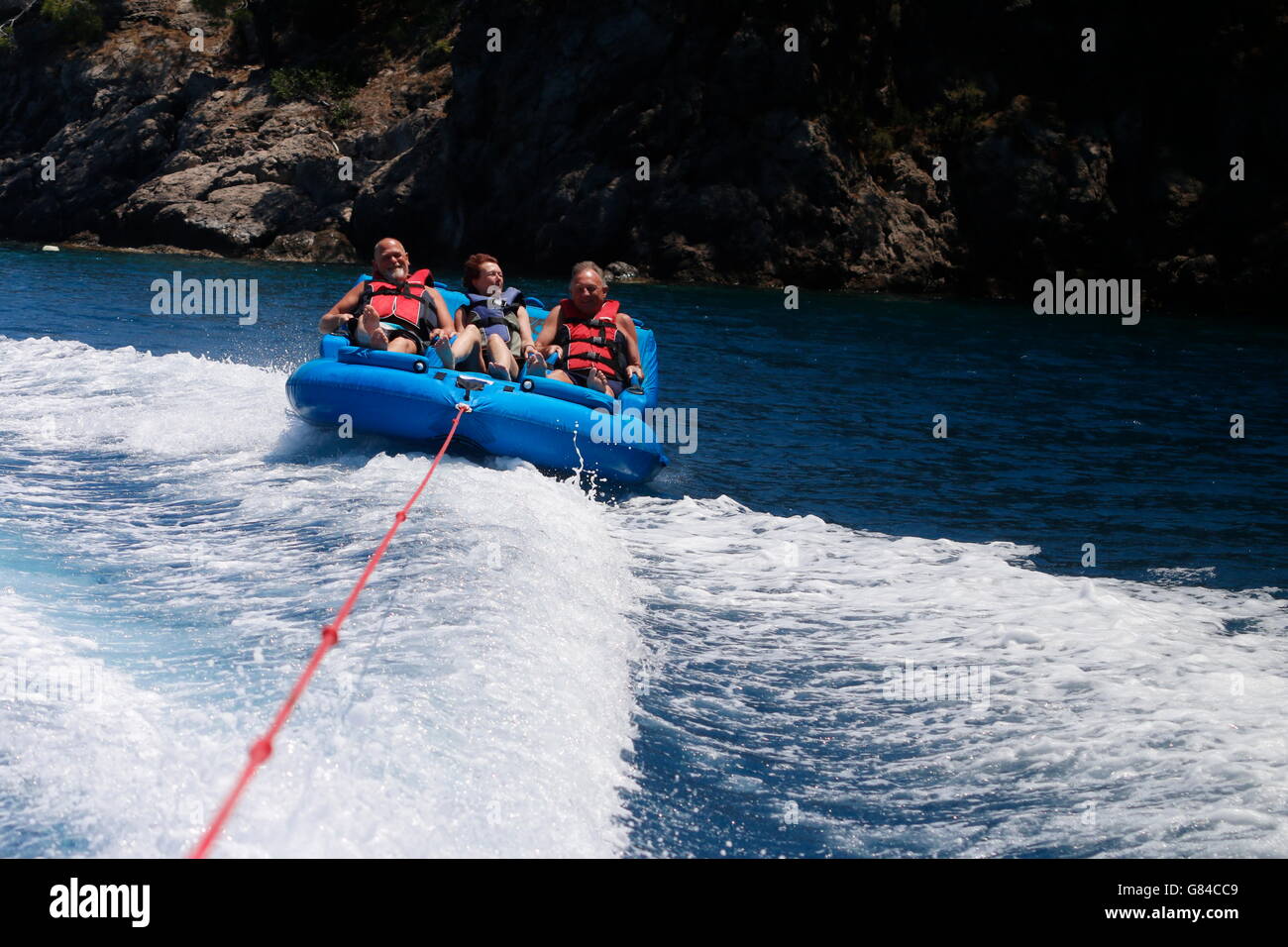 English tourists having fun riding in inflatables Stock Photo - Alamy