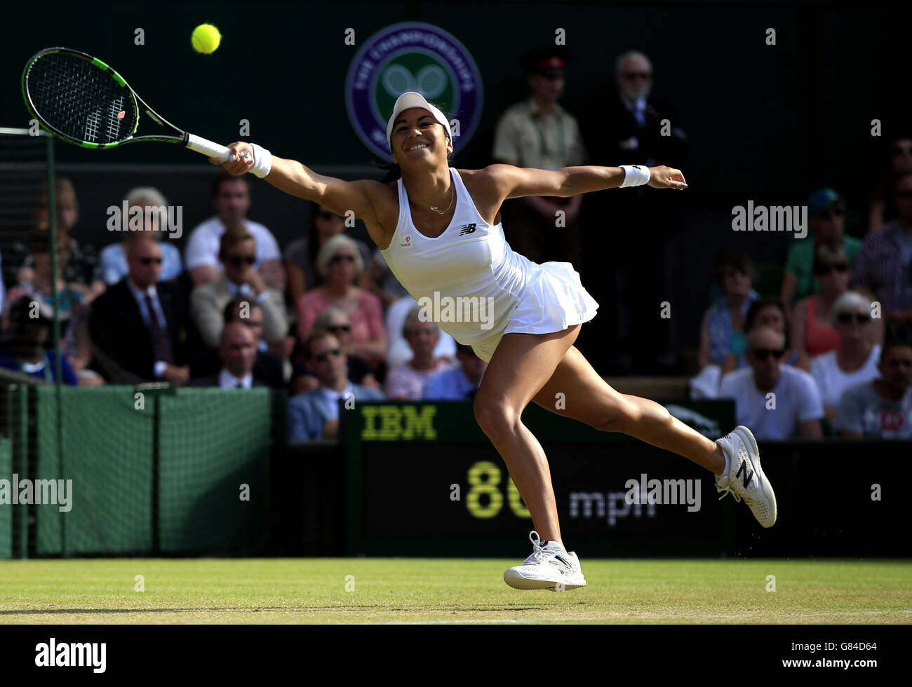 Heather Watson stretches for a shot against Serena Williams during day ...