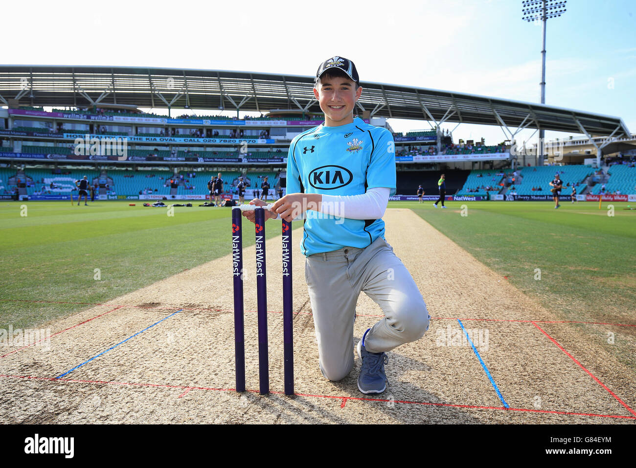 A Surrey fan poses for a photo next to the wicket before the game Stock ...