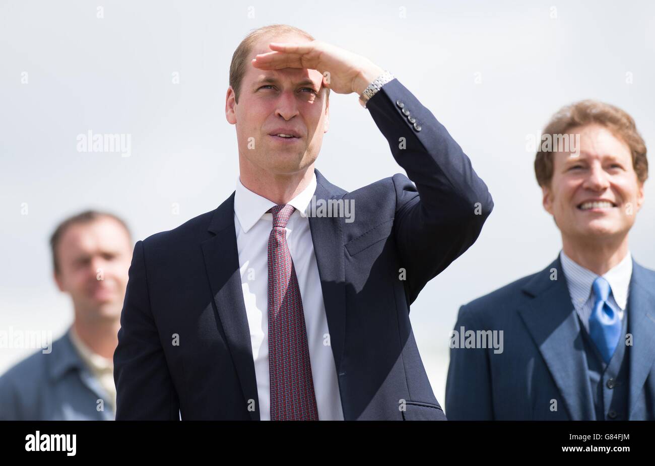 The Duke of Cambridge watches a flying display by a newly restored ...