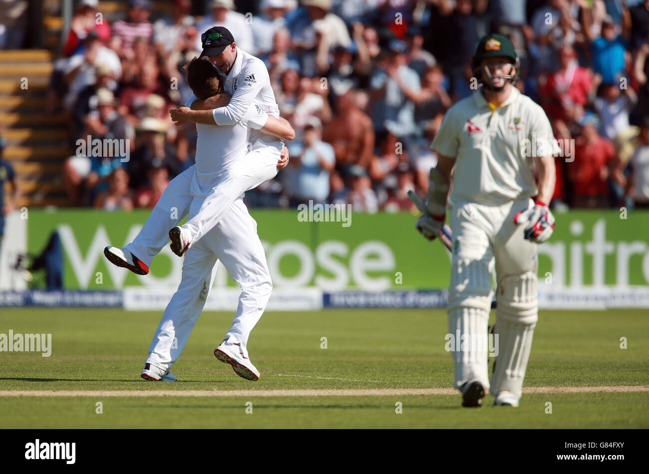 England's Mark Wood and Adam Lyth celebrate the wicket of Australia's ...