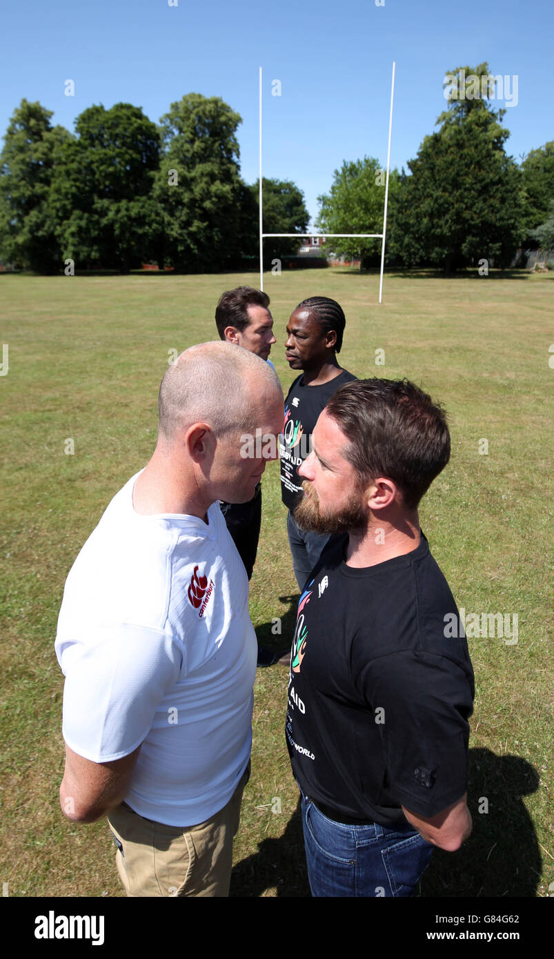 Team England captain Mike Tindal and player Tom Voyce (left) goes head ...
