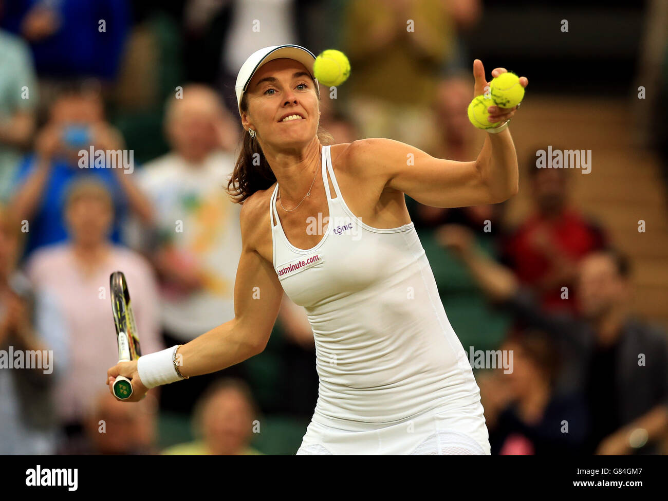 Martina Hingis hits balls into the crowd after winning the Final of the ...