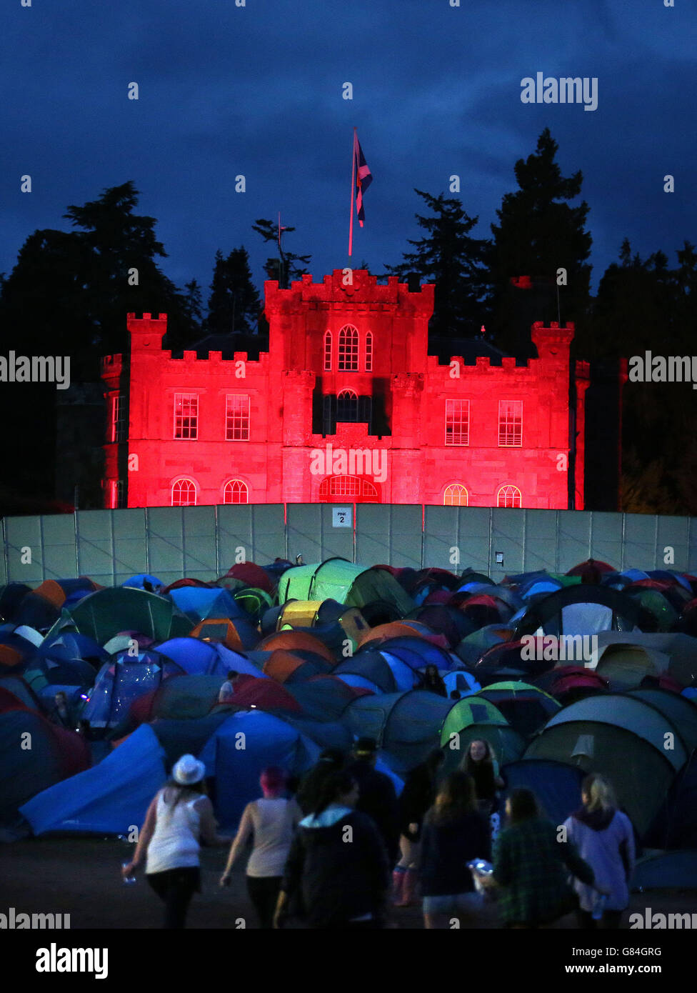 Strathallan Castle is floodlit red as it overlooks the campsite at the ...
