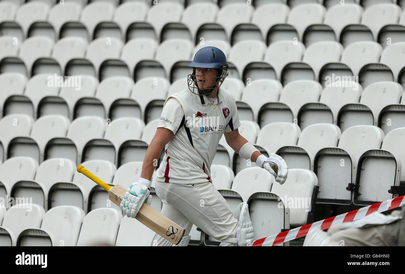 Kent's Sam Northeast looks dejected after caught out by Surrey's Ben ...