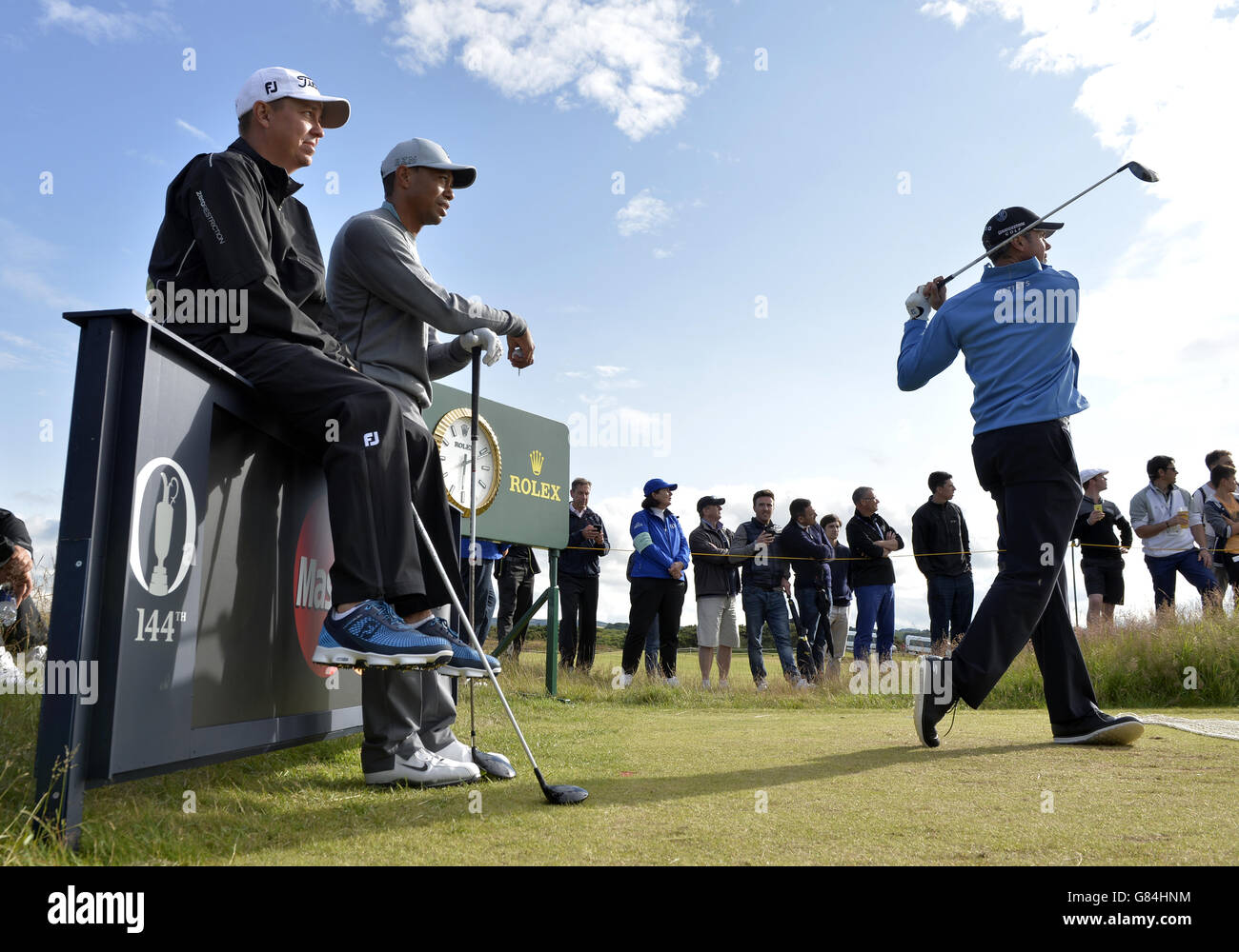 USA's Jason Dufner (left) and USA's Tiger Woods watch USA's Matt Kucher ...