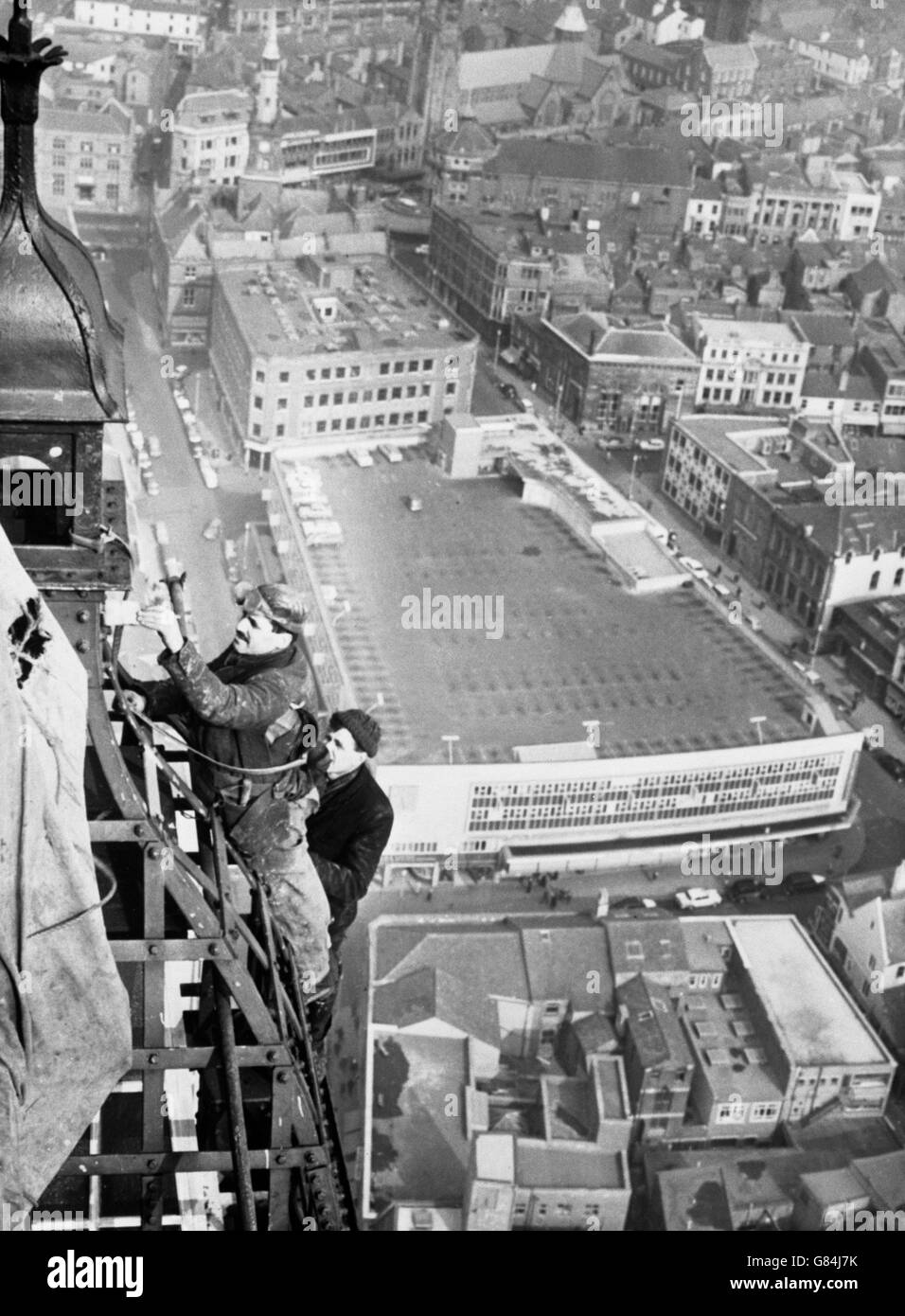 Painters work on Blackpool Tower's north-east turret, 430ft above ...