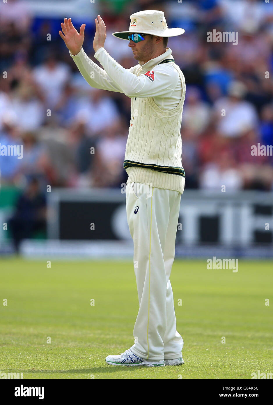Australia captain Michael Clarke directs his players during the First ...