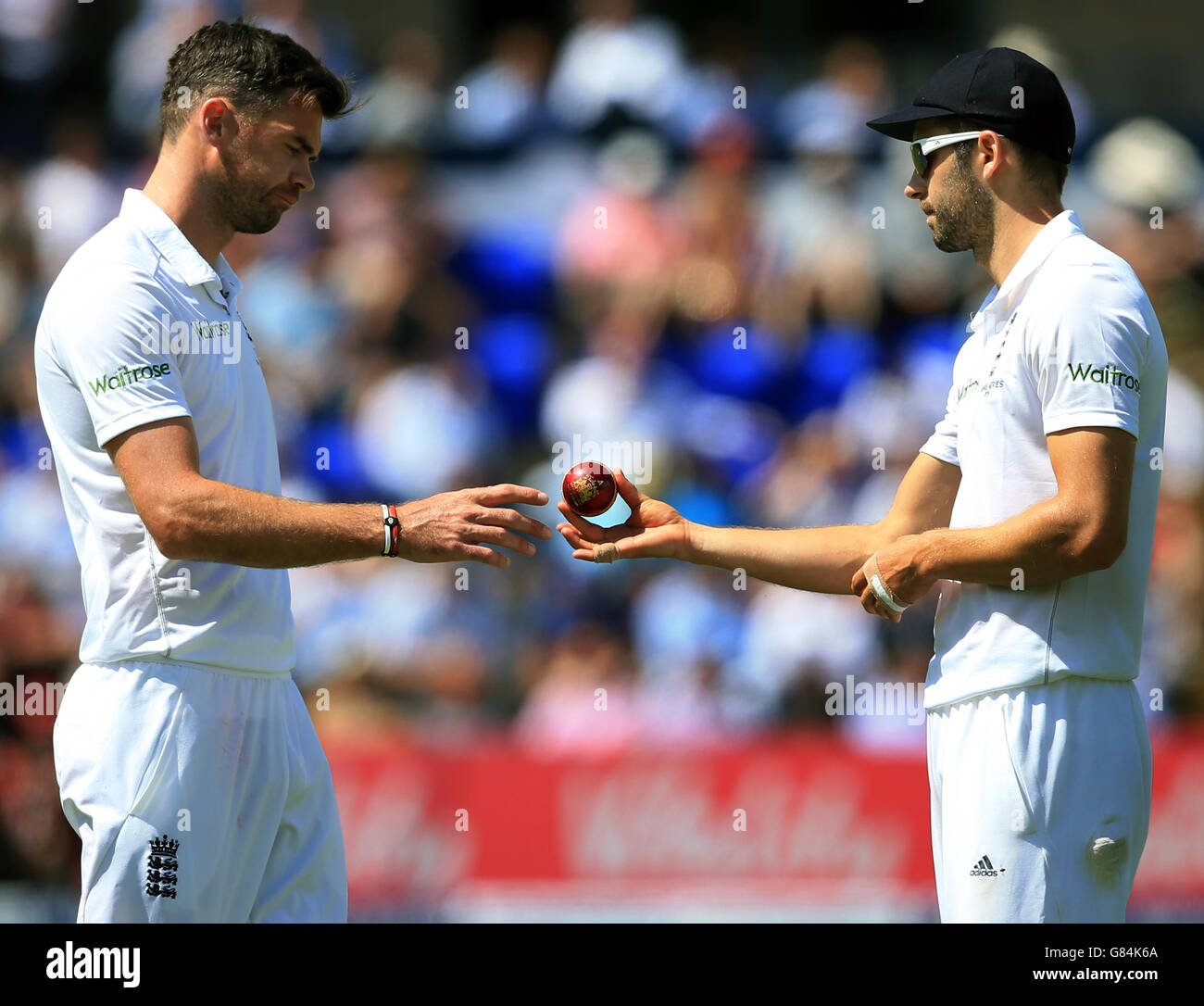England batsman James Anderson (left) takes the new ball off England ...