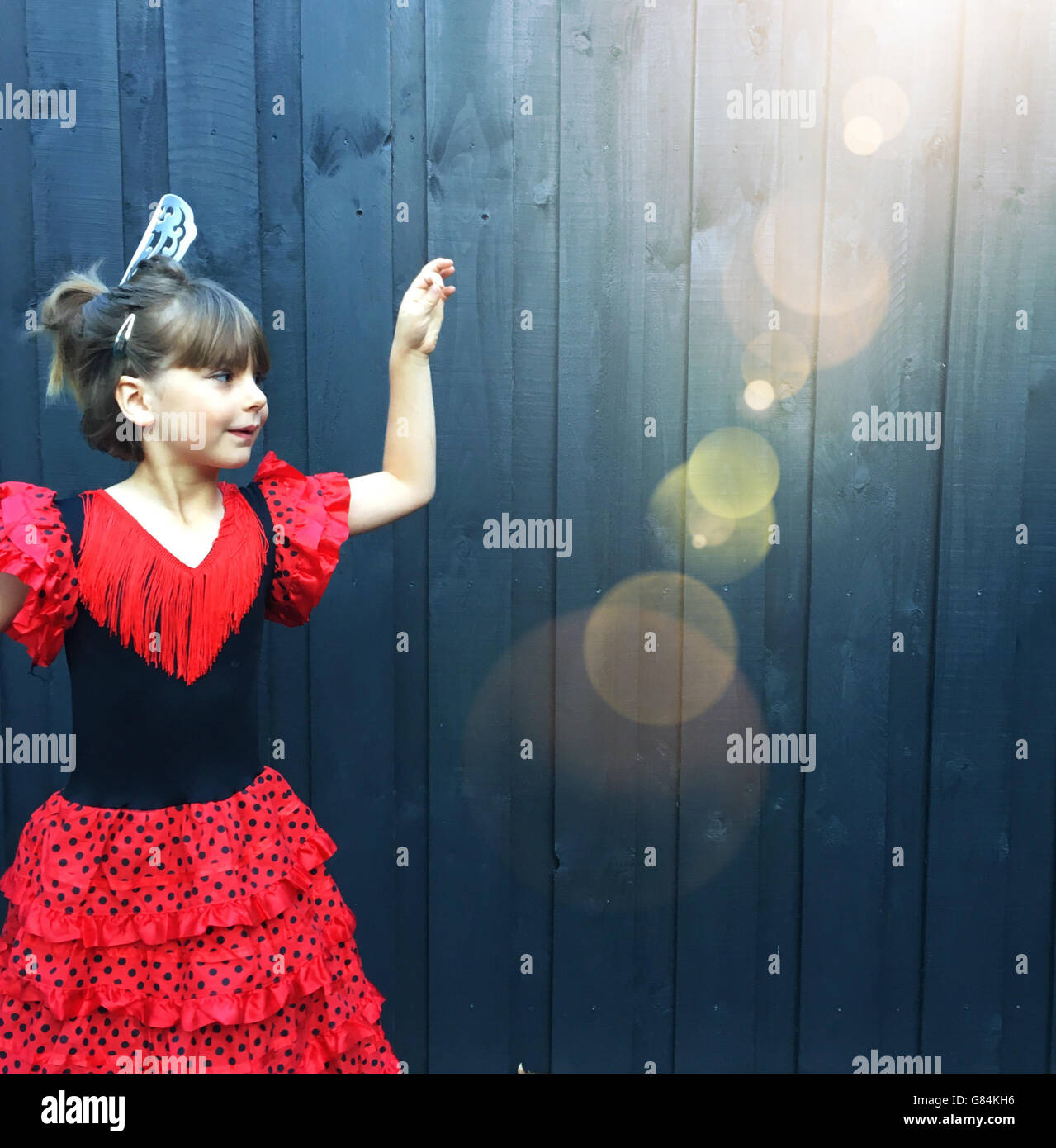 Girl in Spanish traditional clothing flamenco dancing Stock Photo - Alamy