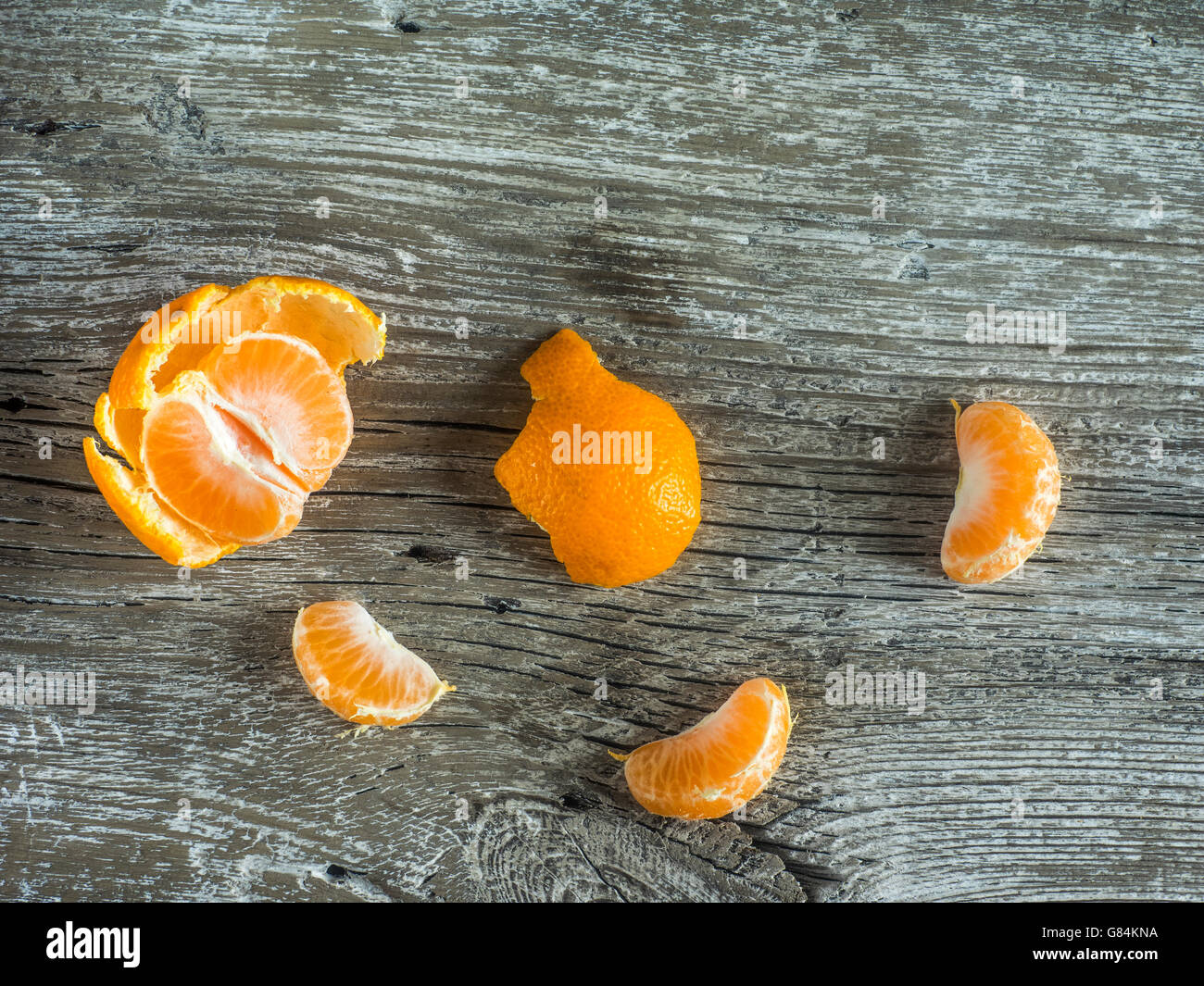 Freshly peeled mandarin fruit Stock Photo - Alamy