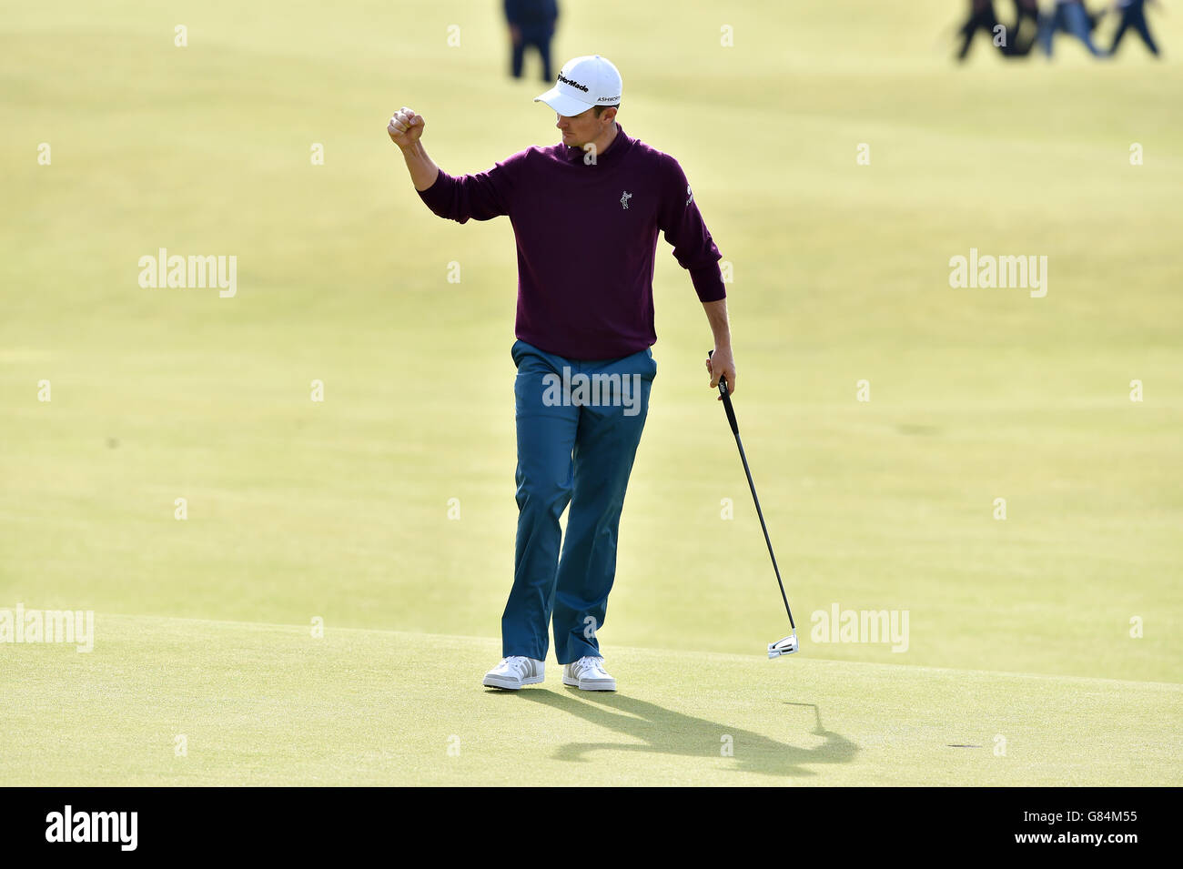 England's Justin Rose celebrates on the 18th green during day four of ...