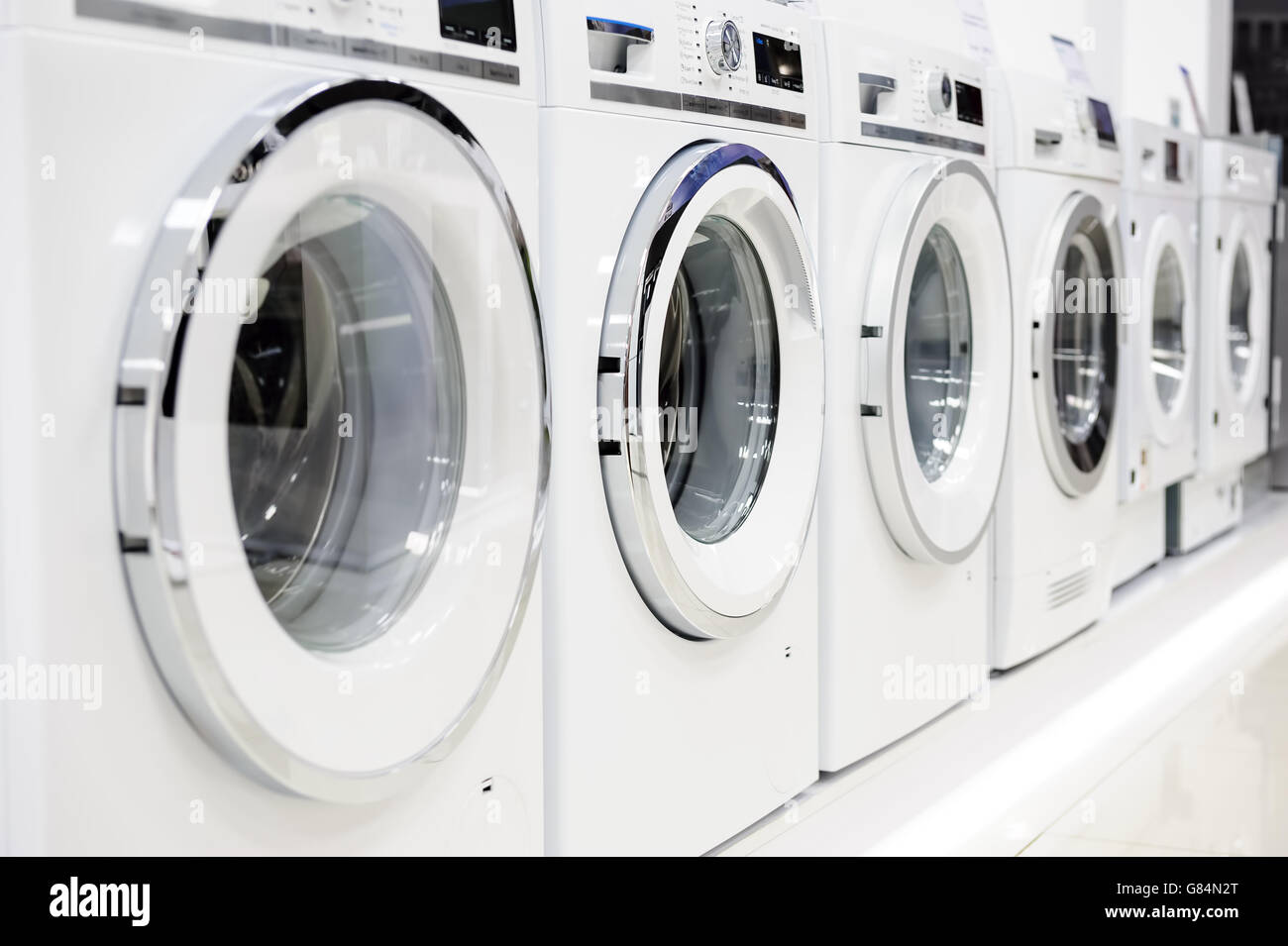 washing mashines in appliance store Stock Photo - Alamy