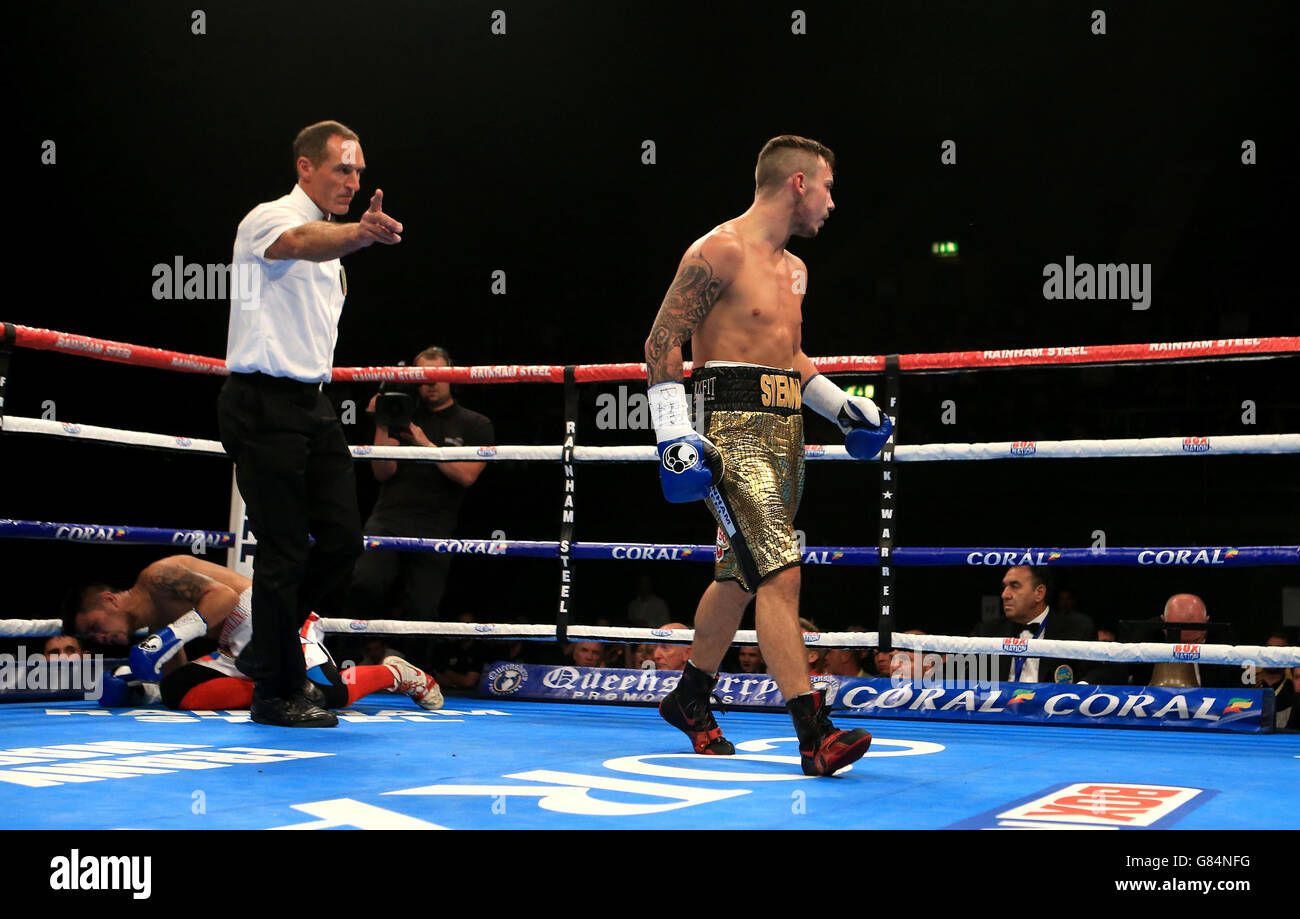 Boxing - SSE Arena - London. Mitchell Smith (right) knocks down Dennis ...