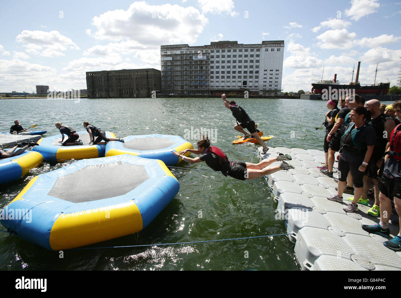 Contestants taking part in the London River Rat Race - a 10km aquatic ...