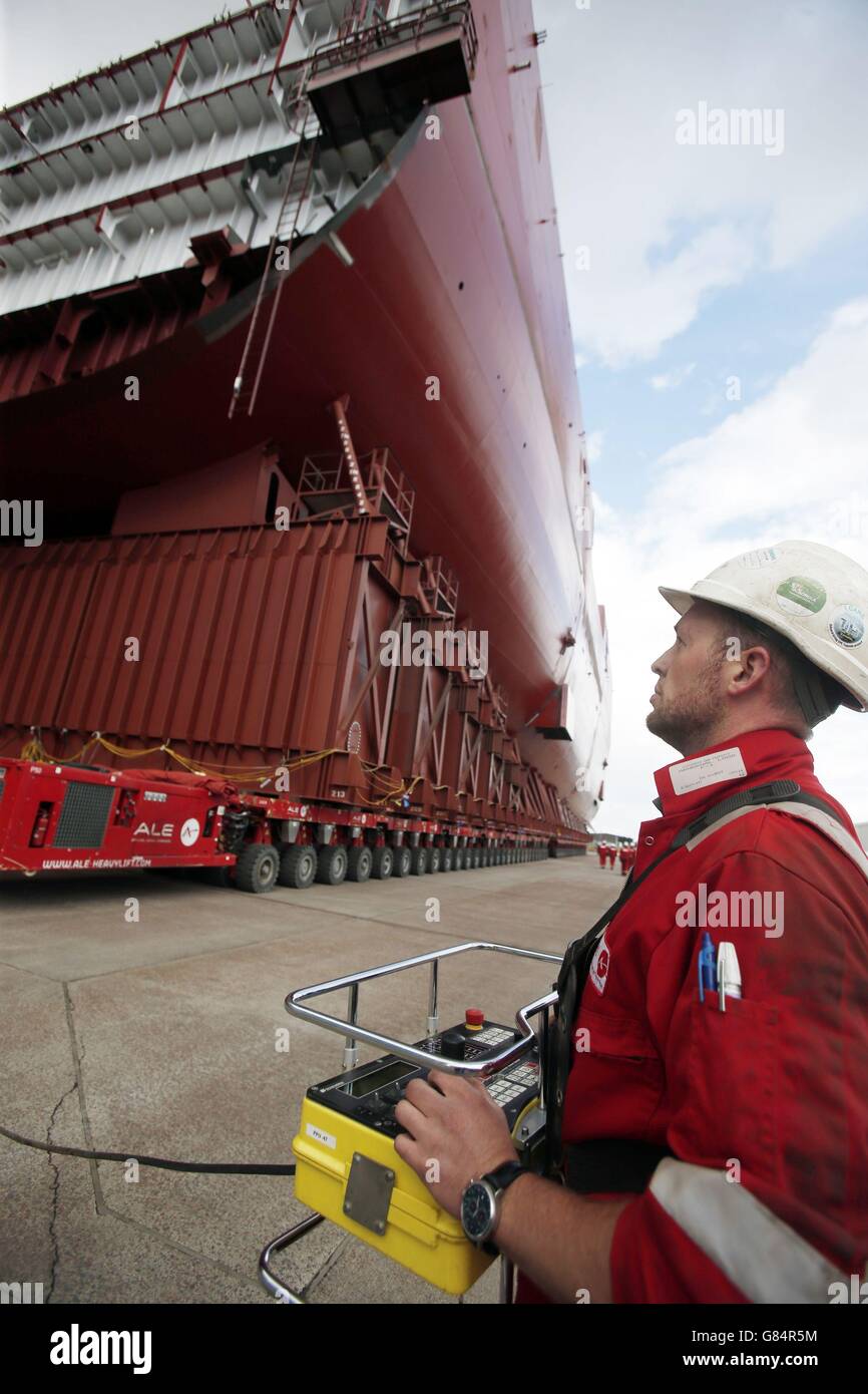 Operations Supervisor Joe Gilbert operates a control unit to move an ...