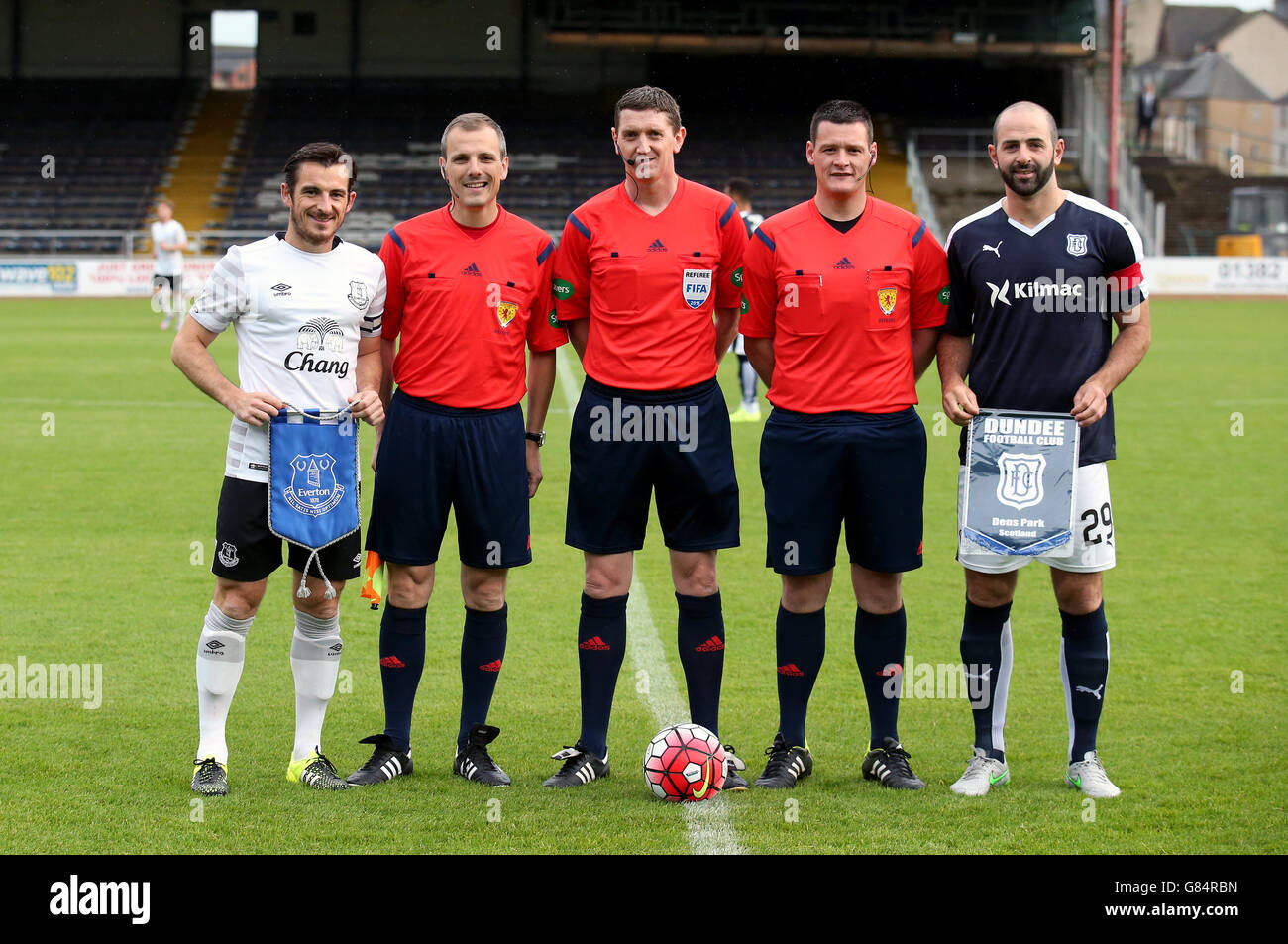Everton's Leighton Baines (left) and Dundee's Gary Harkins with the ...