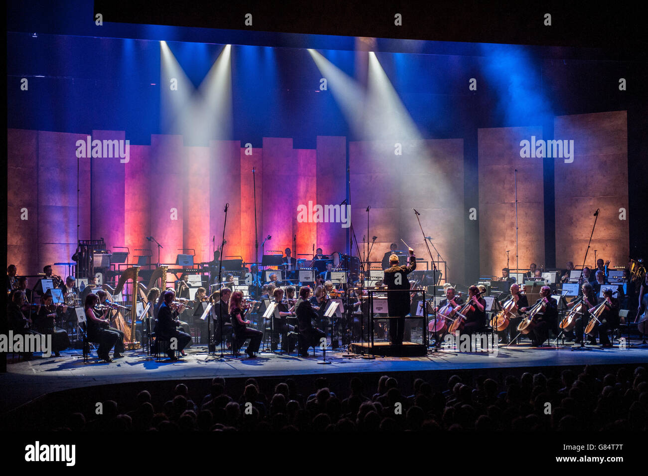 Conductor Grant Llewellyn with the Orchestra of Welsh National Opera ...