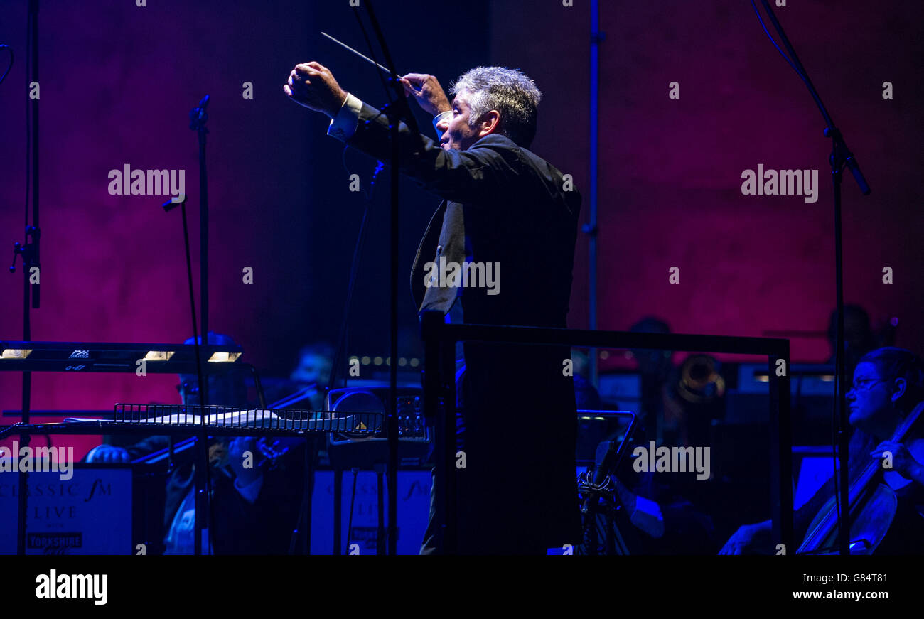 Conductor Grant Llewellyn with the Orchestra of Welsh National Opera ...