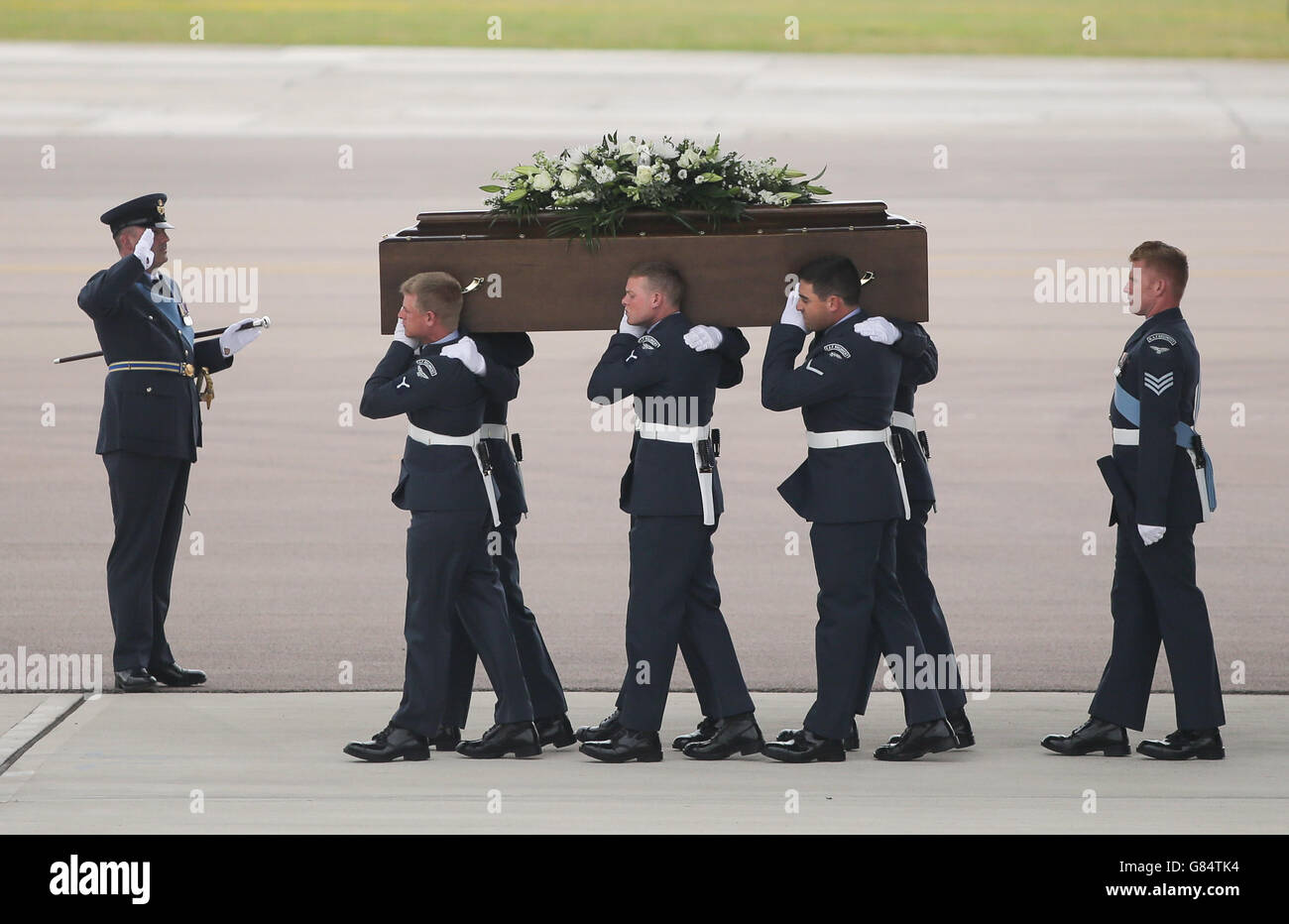 The coffin of Trudy Jones is taken from the RAF C-17 carrying the ...