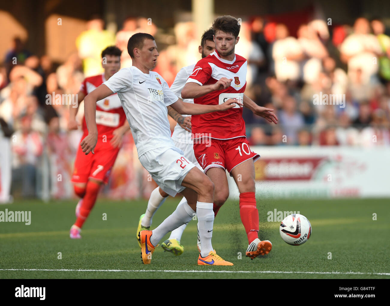 Valletta's Maxim Focsa (left) and Newtown AFC's Jason Oswell (right ...