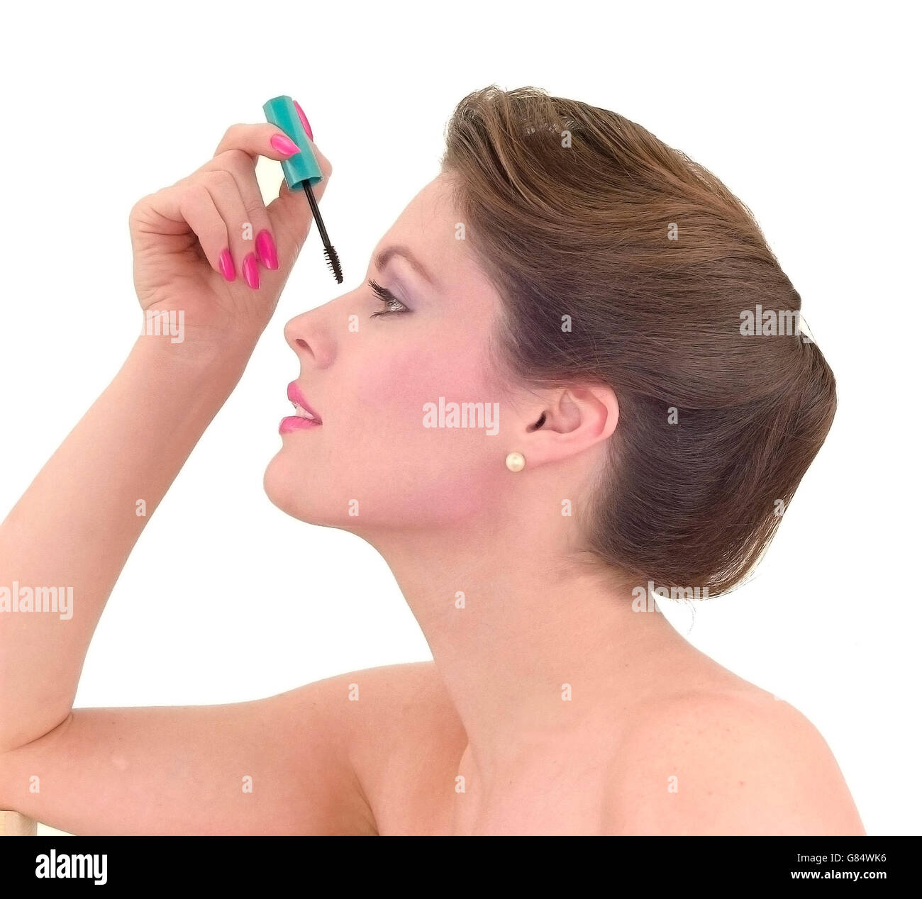 girl applying mascara Stock Photo - Alamy