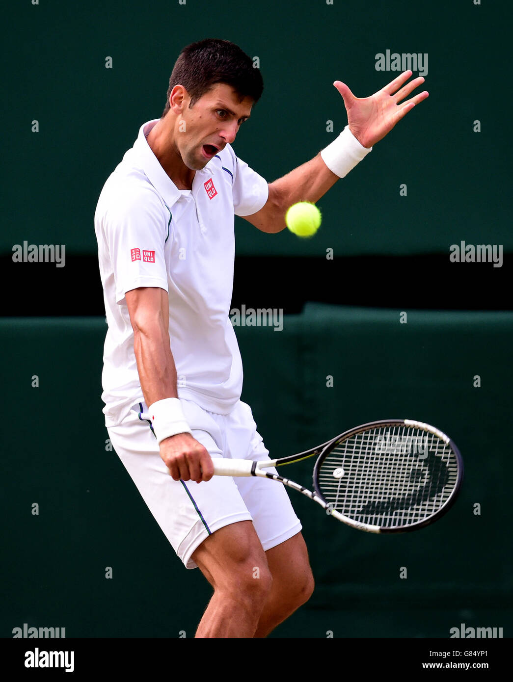 Novak Djokovic in action against Marin Cilic during day Nine of the ...