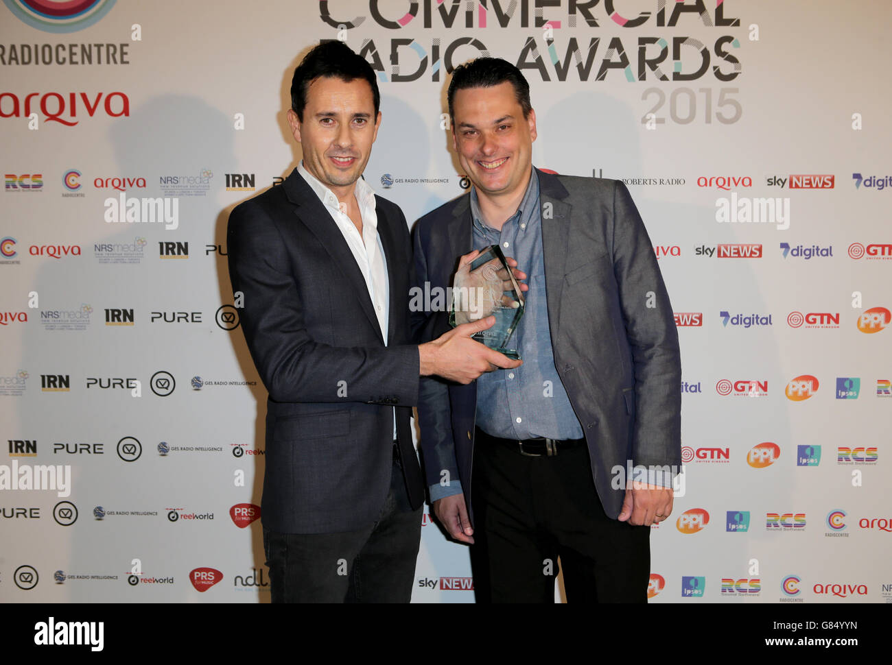 Andy Roberts (left) with the Programmer of the Year award at the Arqiva ...