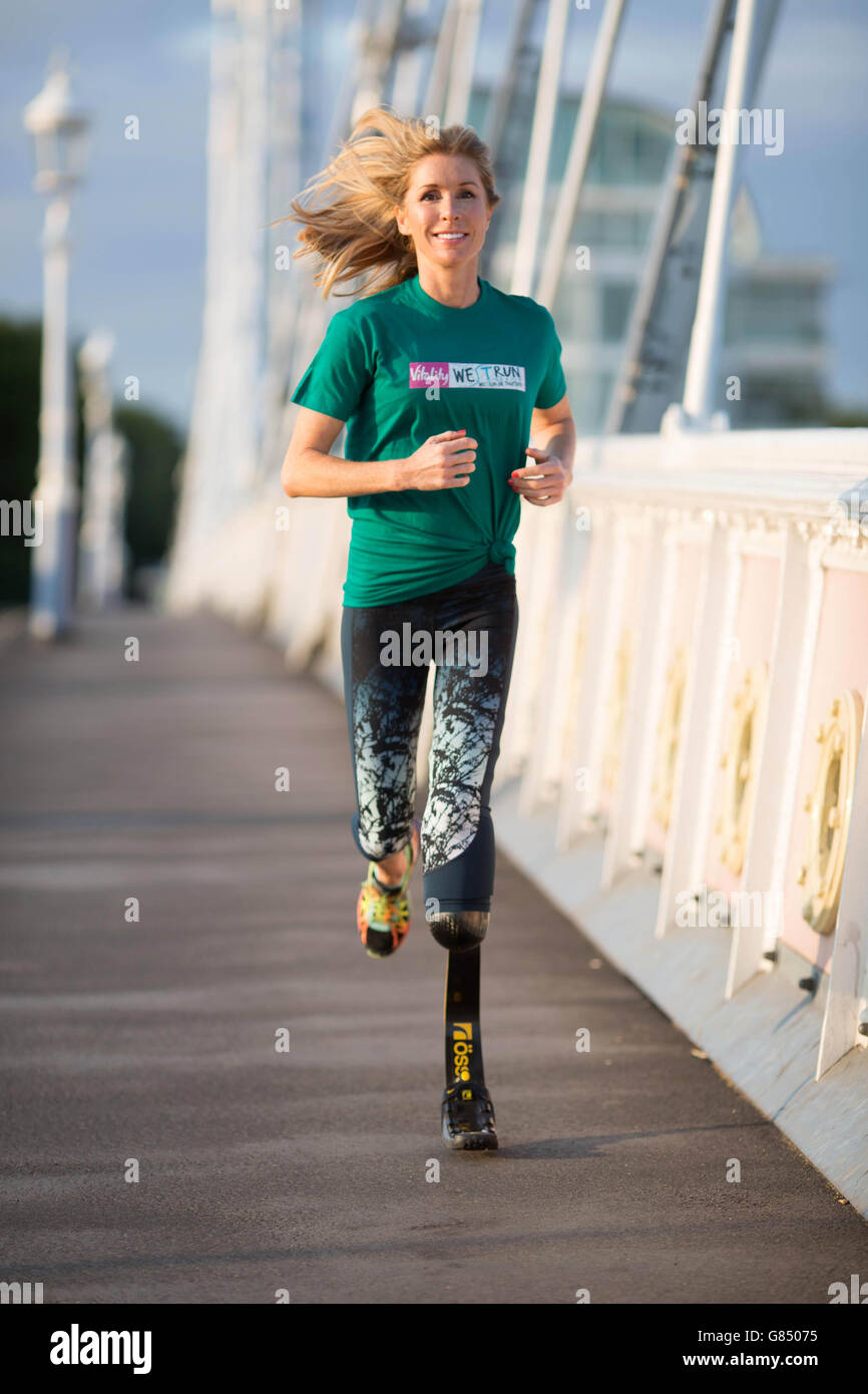 EDITORIAL USE ONLY Victoria Milligan makes her way over Chelsea Bridge ...