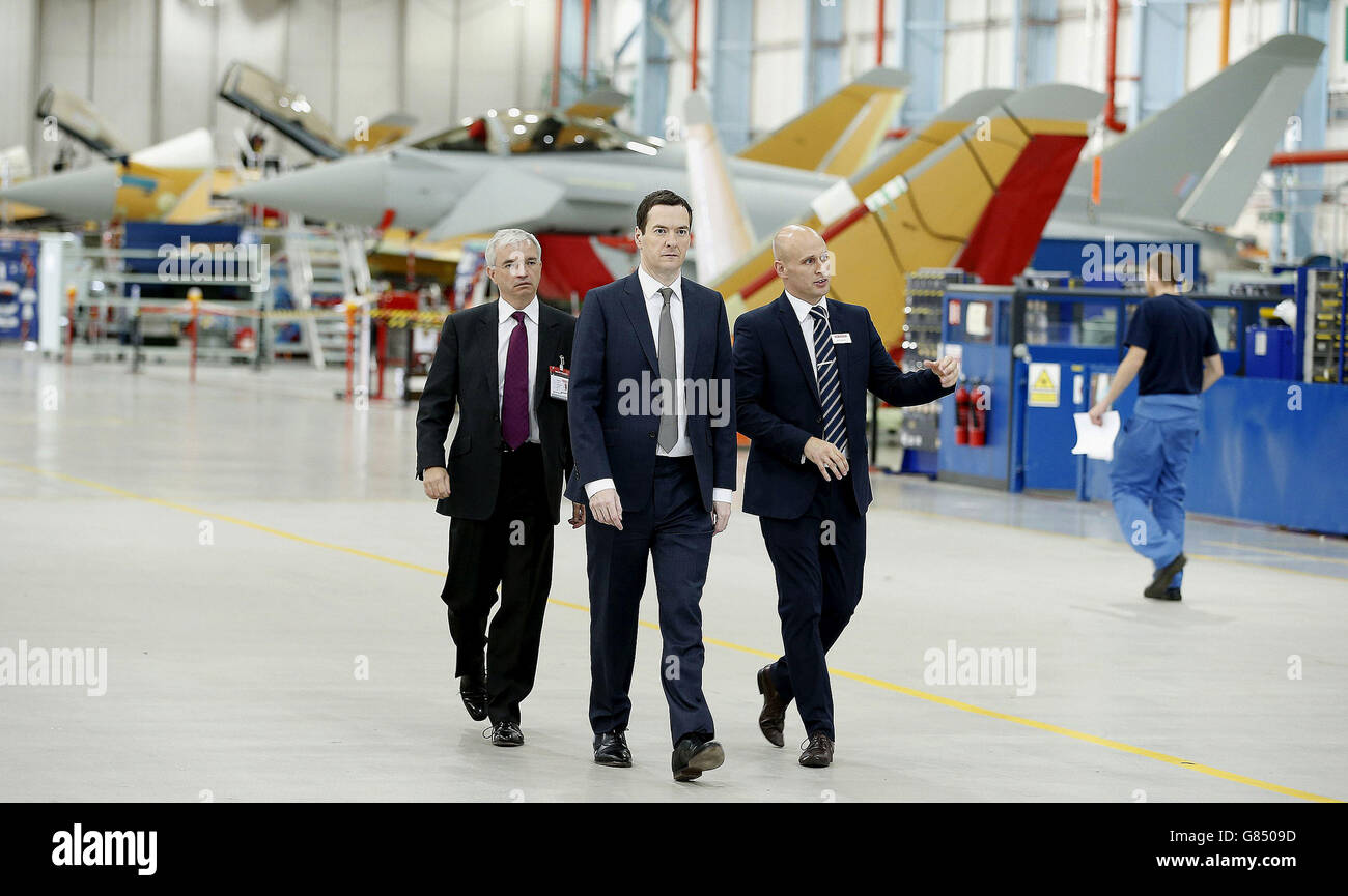 Chancellor of the Exchequer George Osborne (centre) during his visit to ...