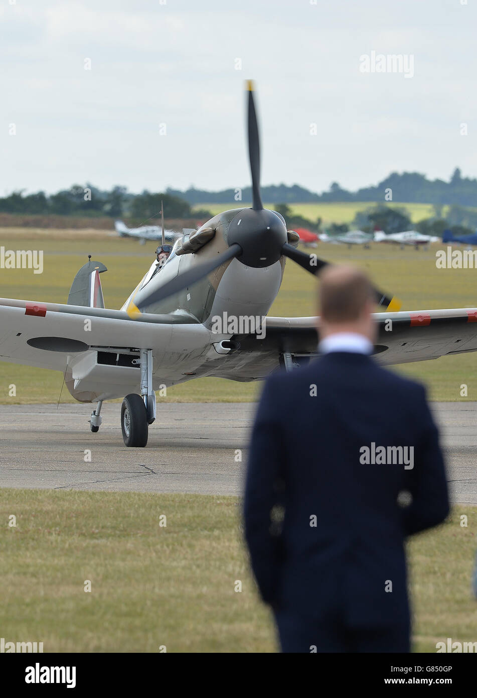 The Duke of Cambridge watches a flying display by a newly restored ...