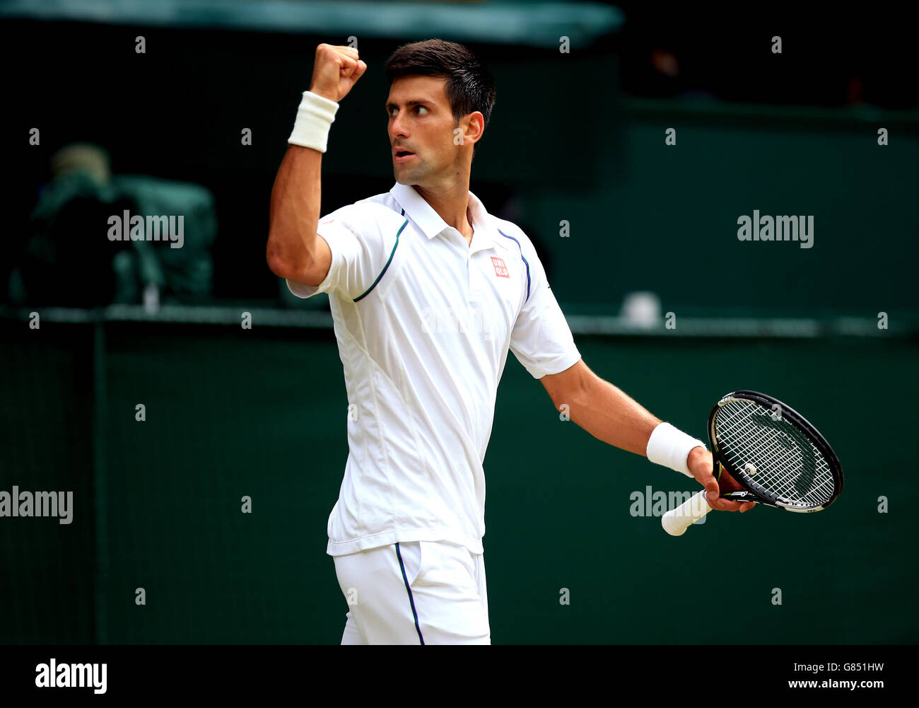 Novak Djokovic celebrates holding serve against Roger Federer in the ...