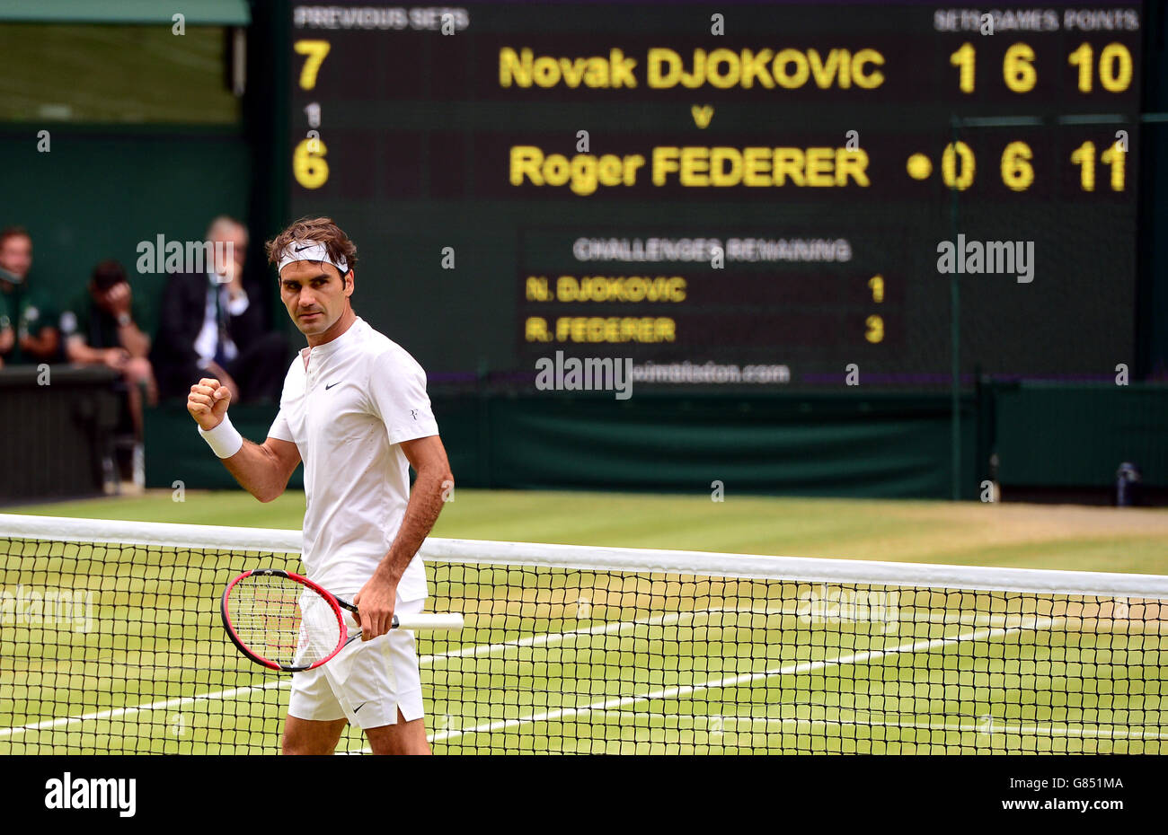 Roger Federer celebrates winning the second set against Novak Djokovic ...