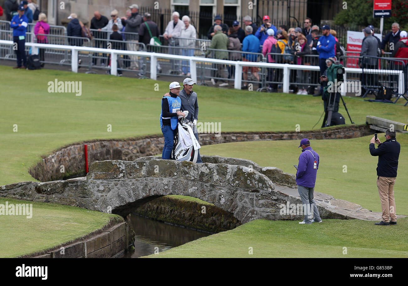 England's Justin Rose poses for a photo on the Swilcan Bridge with his ...