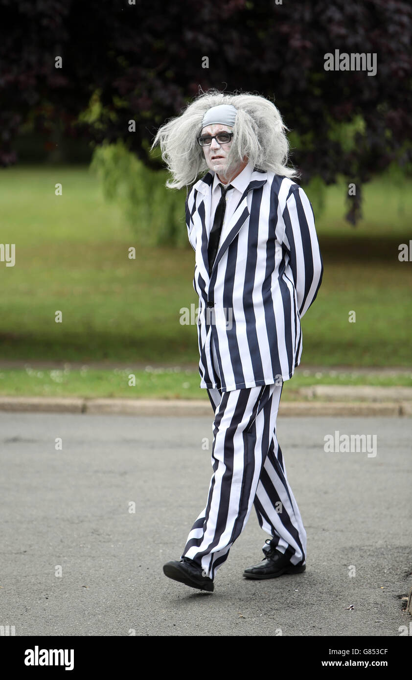 A man dressed as Beetlejuice attends the Halloween-themed funeral of ...