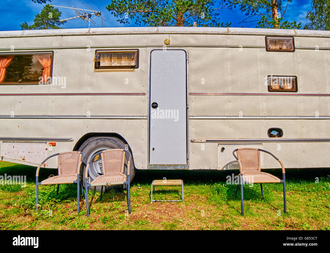Big Old American RV / Camping Car in Pine Forest Setting Stock Photo ...