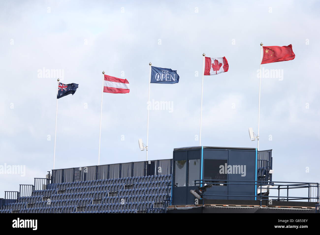 A view of flags blowing as high winds suspend play during day three of ...