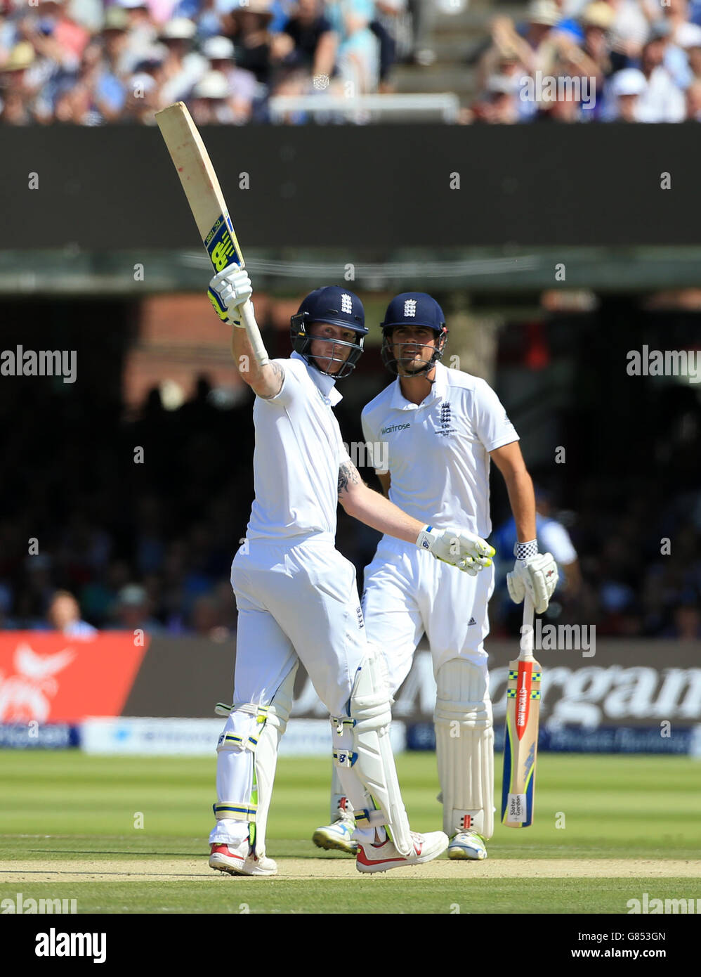 England's Ben Stokes raises his bat to acknowledge the crowd after ...