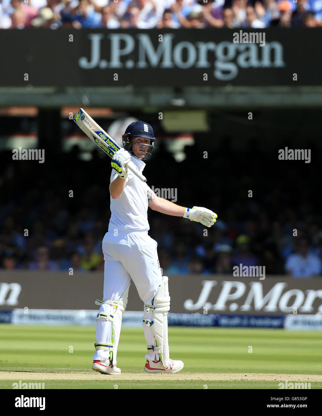 England's Ben Stokes raises his bat to acknowledge the crowd after ...