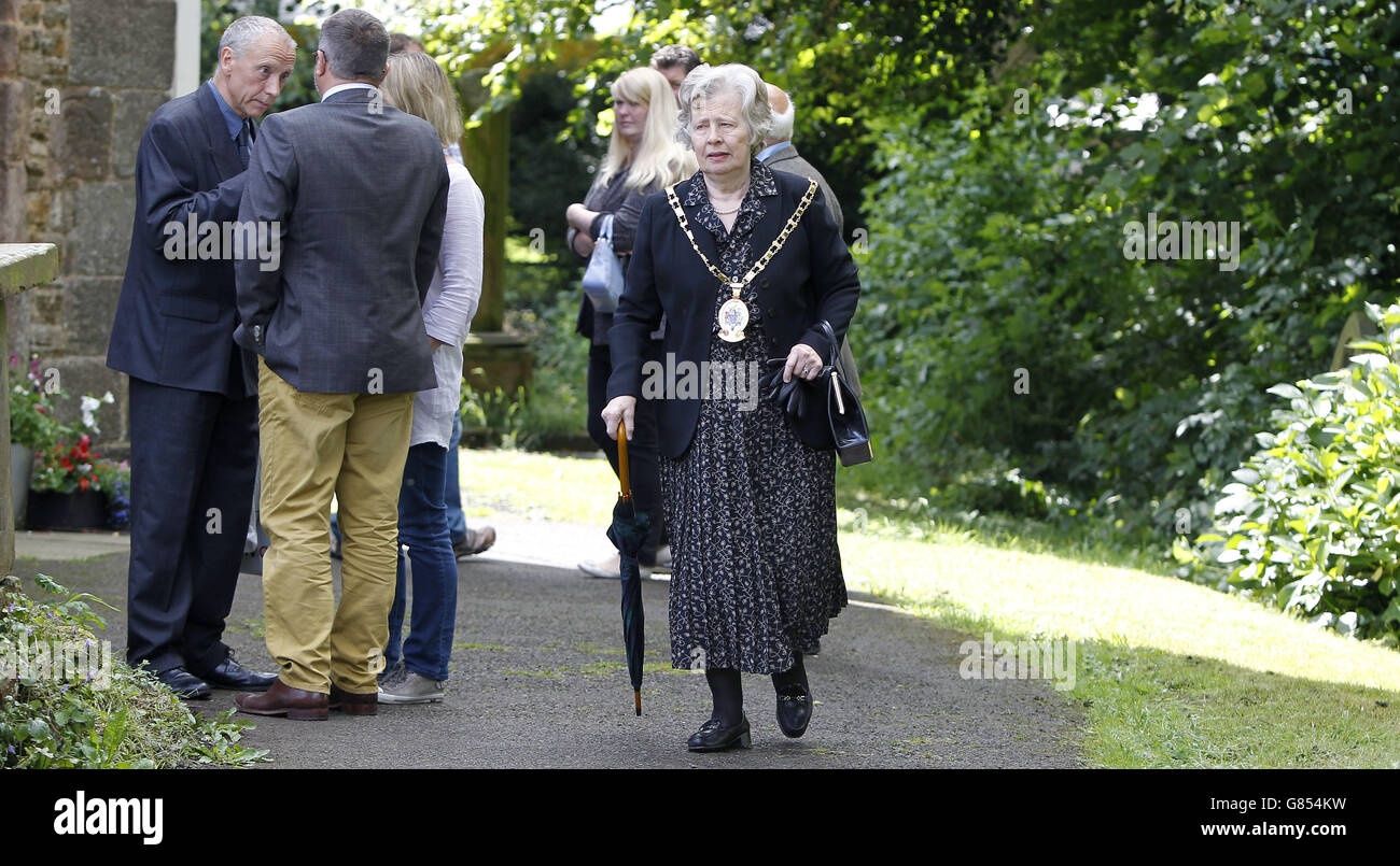 People leave St Mary's Church in Bosley, after a service for the four ...