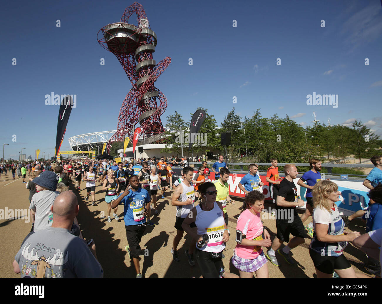 Competitors take part in the Morrison's Great Newham London Run, Queen ...