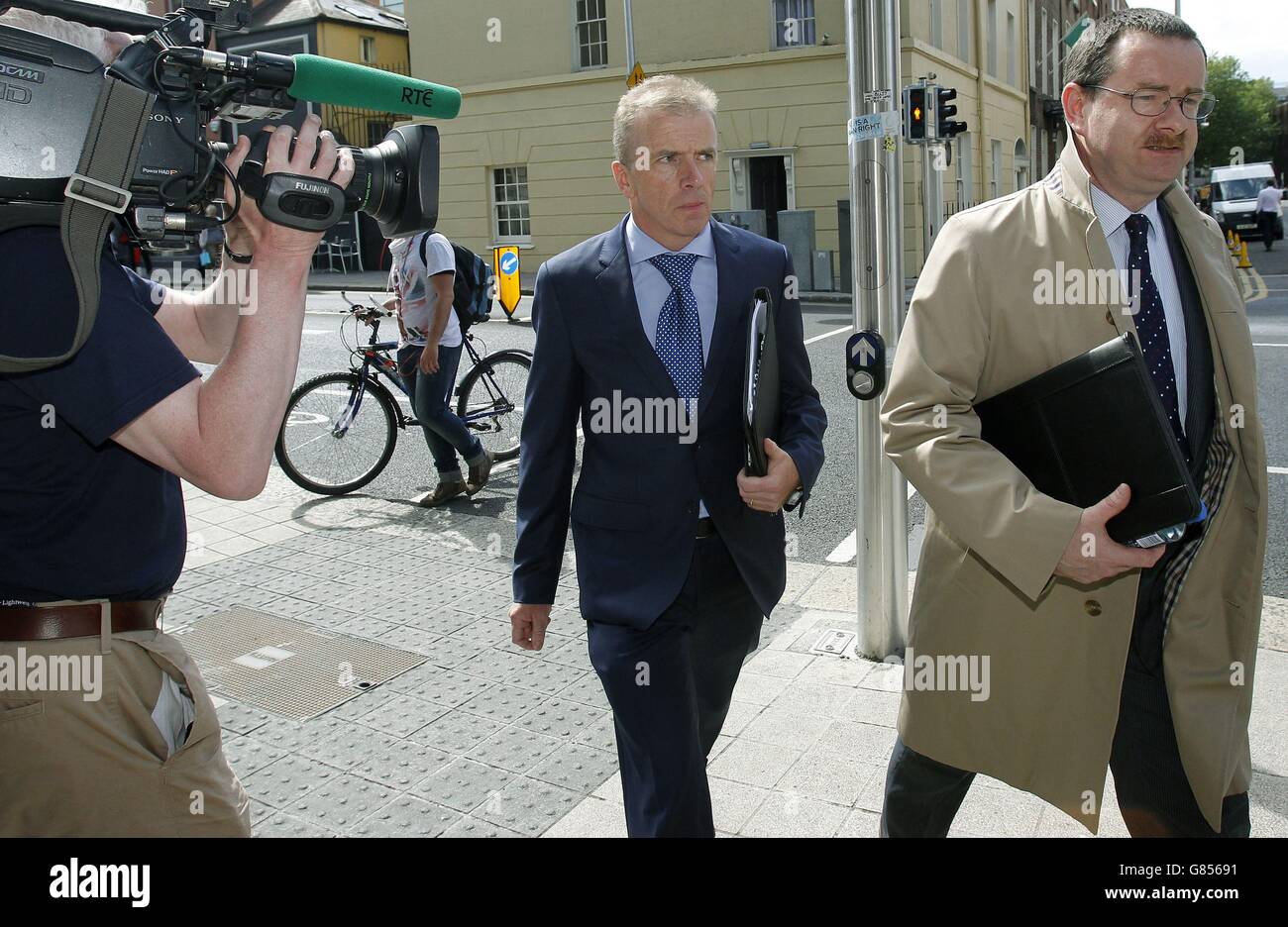 Property developer Joe O'Reilly (centre) arrives at Leinster House ...