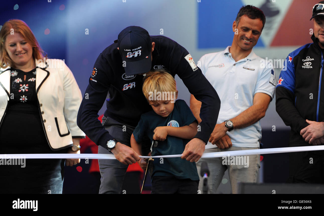 Land Rover BAR's skipper Sir Ben Ainslie helps local school child Leo ...